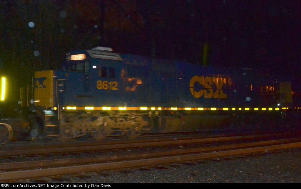 CSX SD50-3 8612 trails on Q409-23